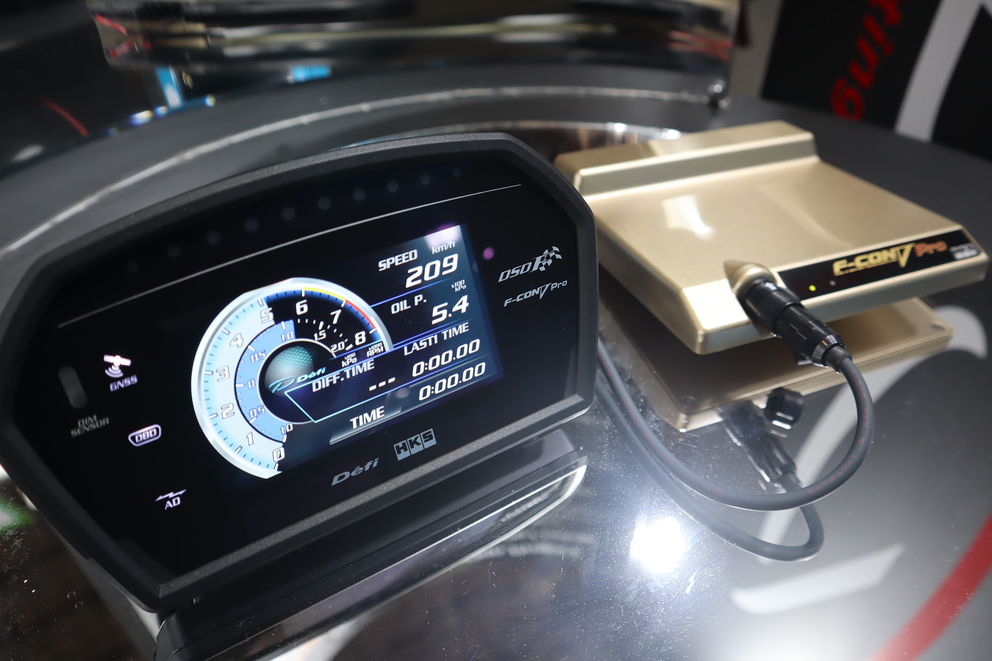 日本精機株式会社|ニュース|「東京オートサロン2025」に出展し､Defi製品・LumieHUD・プロジェクター搭載のコンセプトカー等を展示 ～Defi日本精機ブースへご来場ありがとうございました